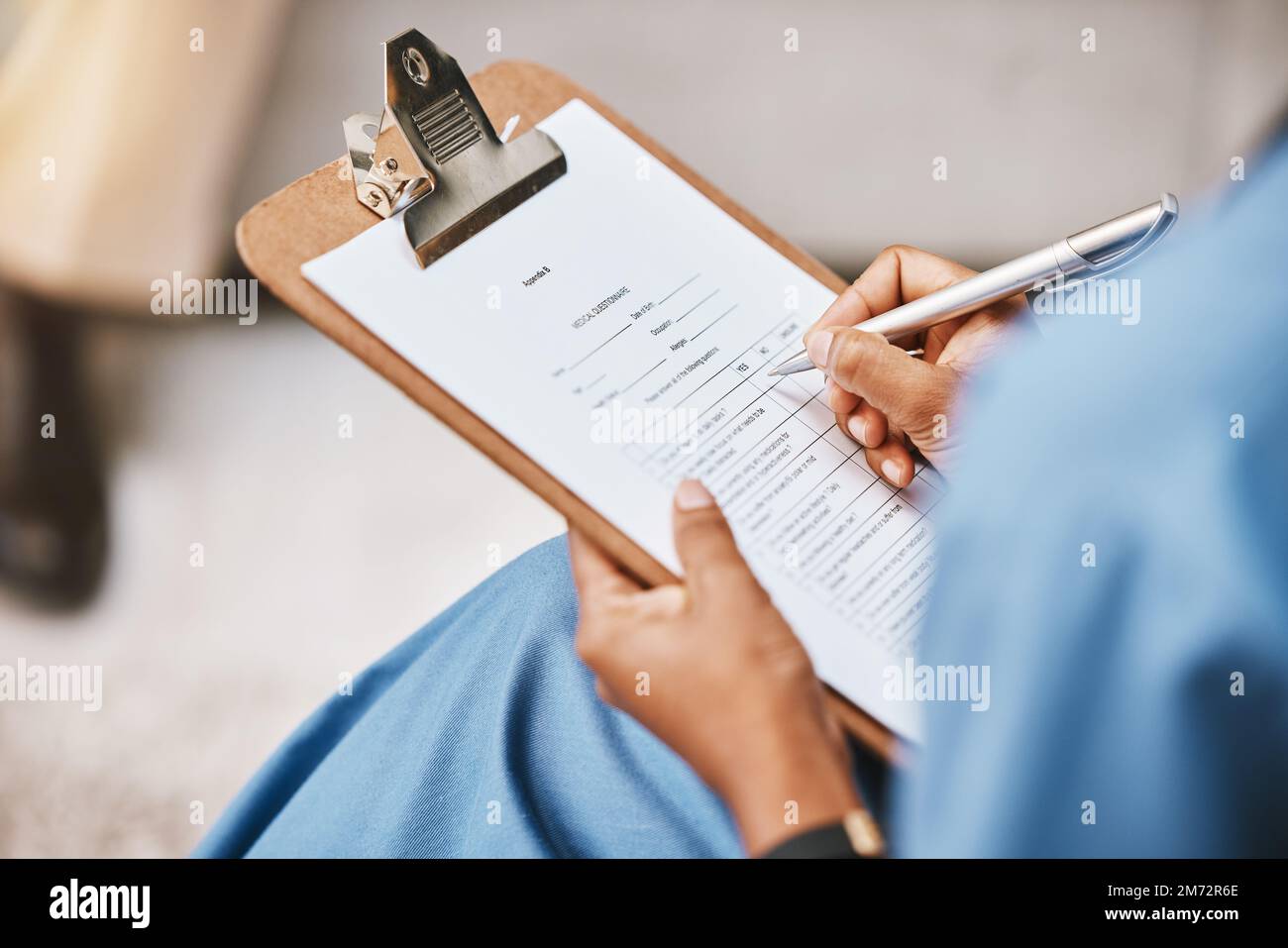 Nurse, clipboard and writing checklist for patient, healthcare ...
