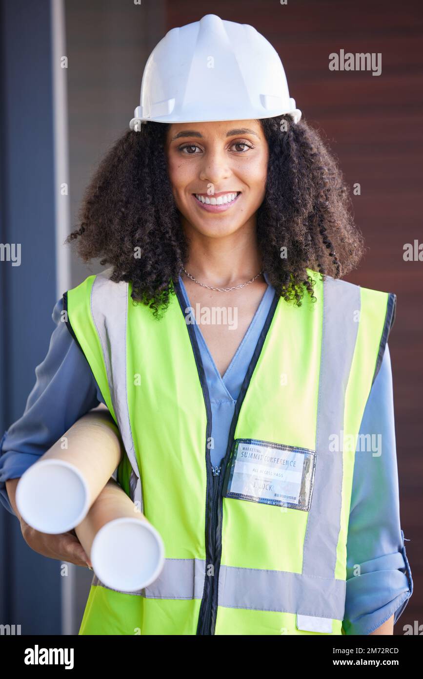 Portrait, architect and blueprint with a black woman designer wearing a ...