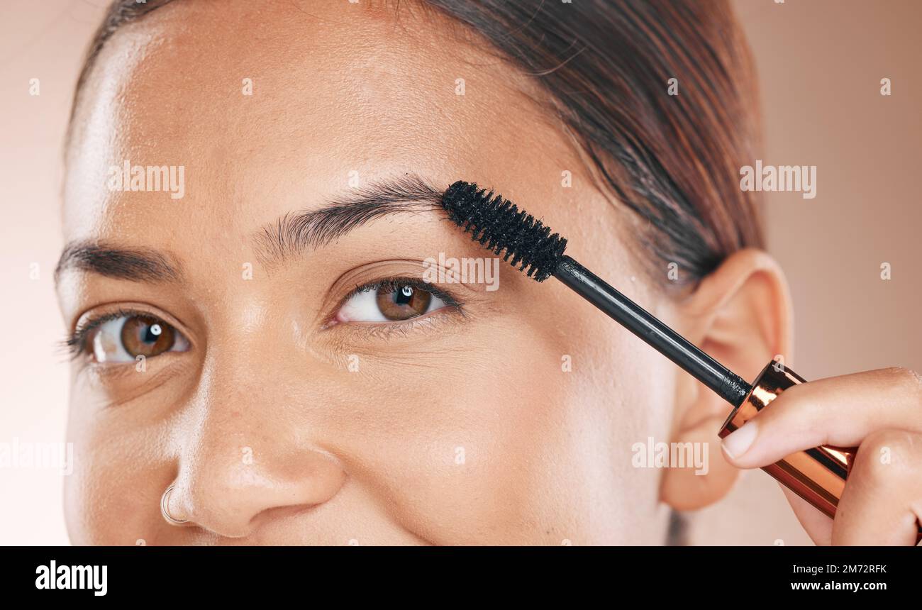 Woman, brush eyebrows and makeup for beauty, cosmetic beauty or self ...
