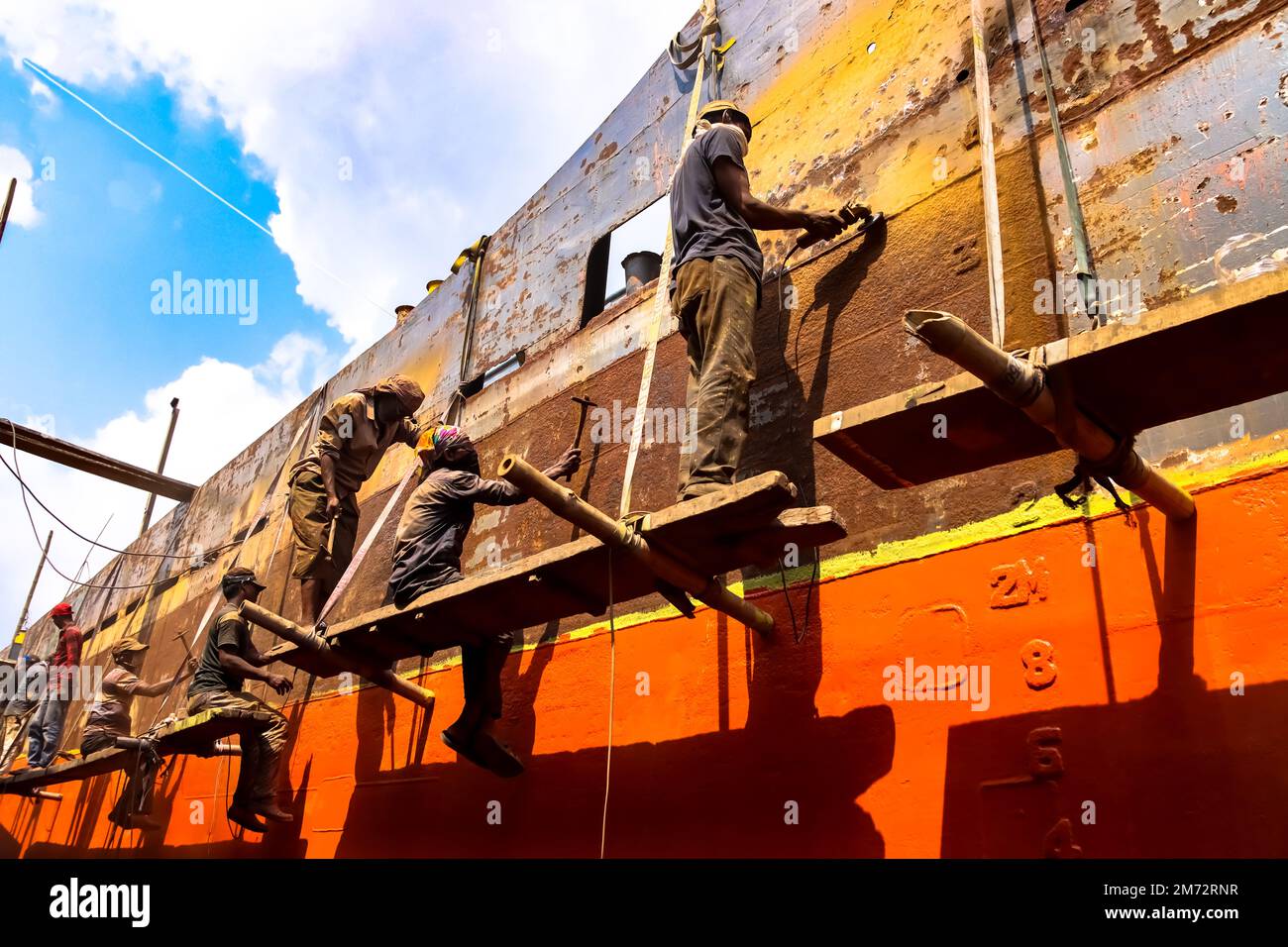 workers working to repair ship Stock Photo - Alamy