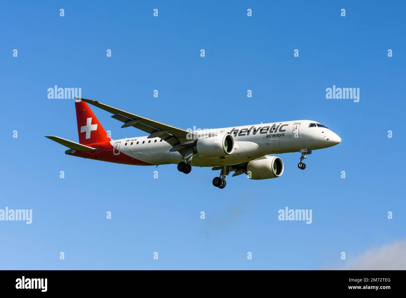Passenger plane Embraer E190-E2 of Helvetic Airways on approach to ...