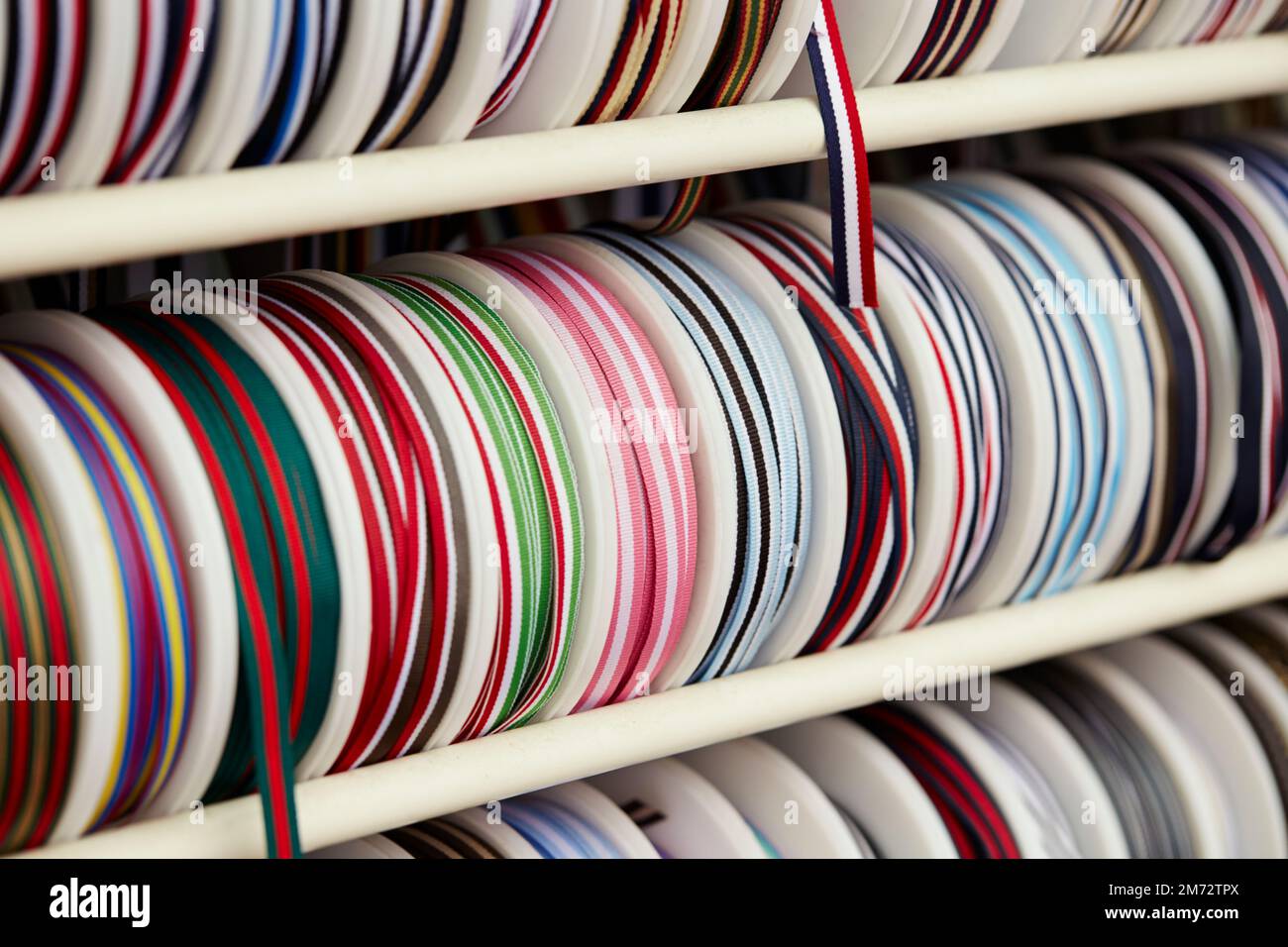 Various ribbons displayed in a traditional market Stock Photo - Alamy