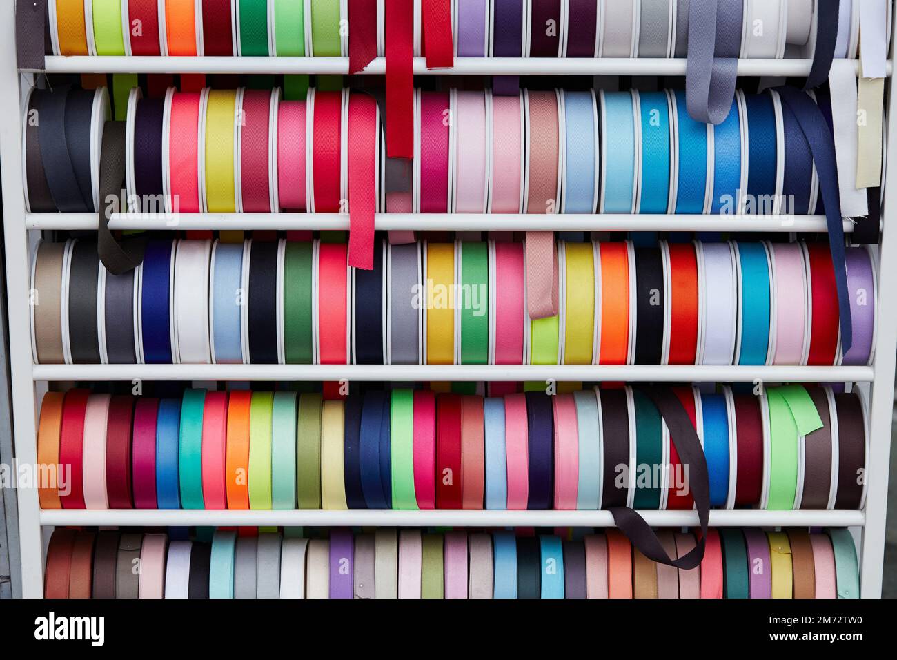 Various ribbons displayed in a traditional market Stock Photo - Alamy
