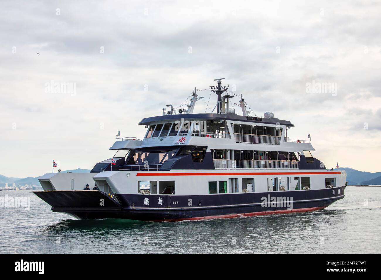 Hiroshima Japan: the ferry is on the way from Miyajima guchi to Island ...