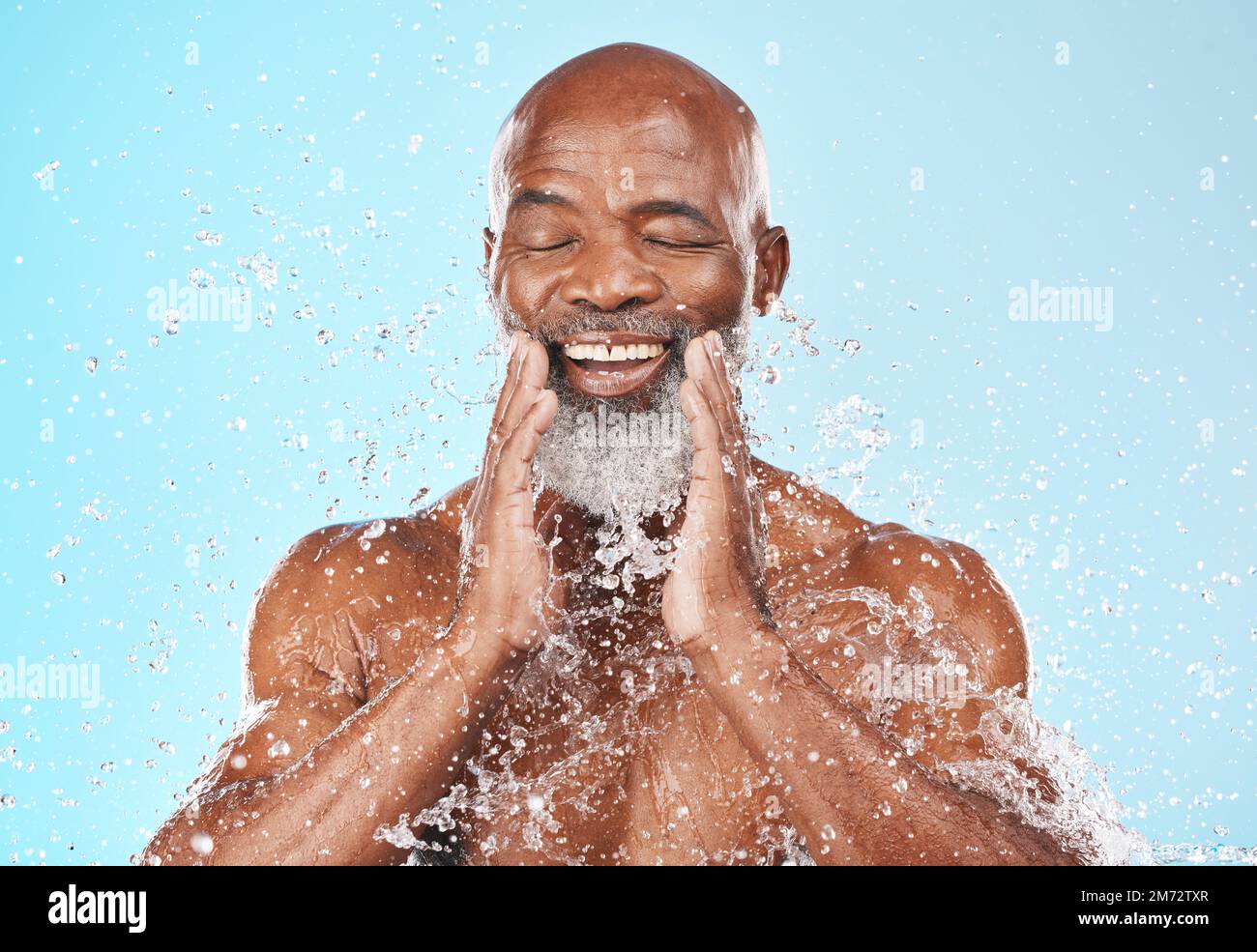 Water splash, natural routine and cosmetics of black man with facial skincare benefits ...