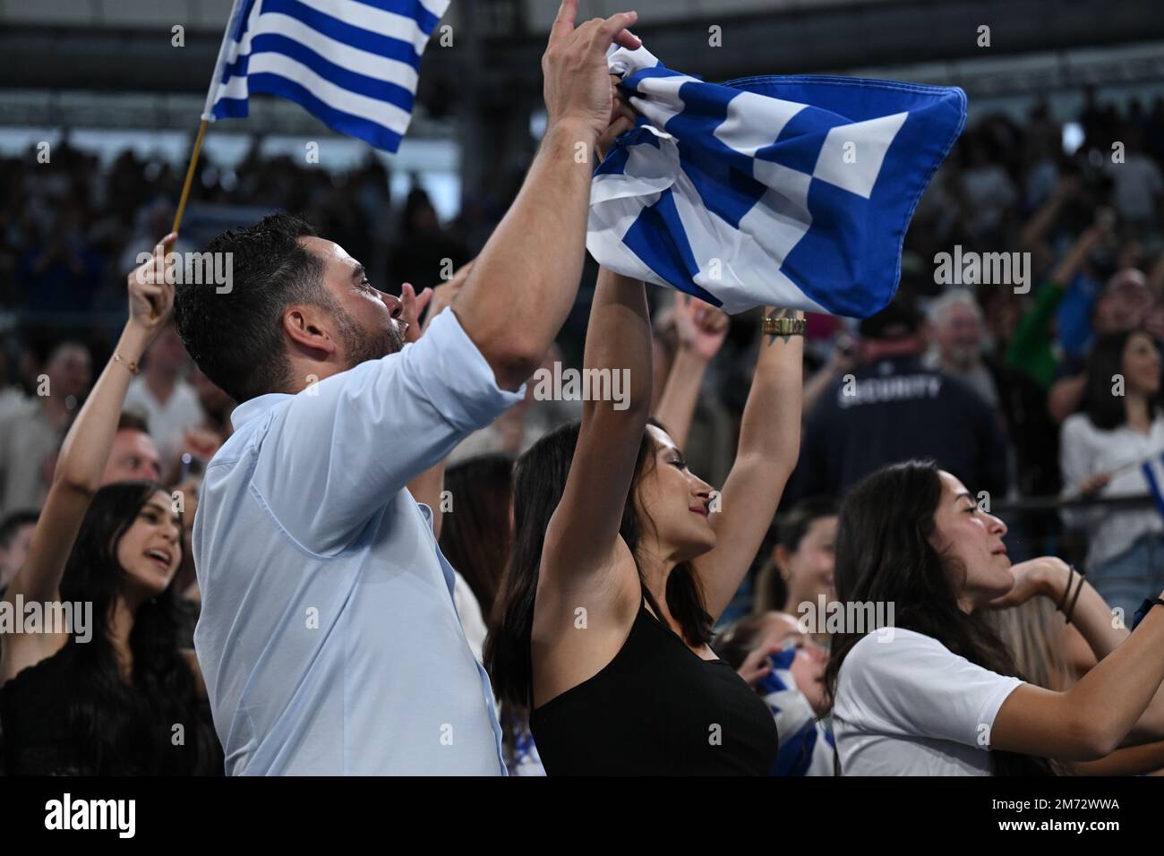 Greek supporters celebrate after Stephanos Tsitsipas of Greece defeats ...