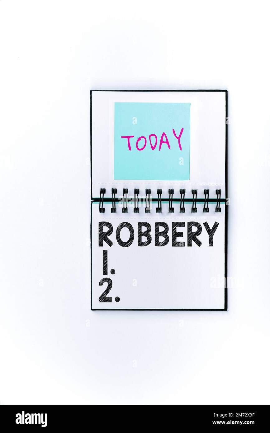 Sign displaying Robbery. Concept meaning the action of taking property ...