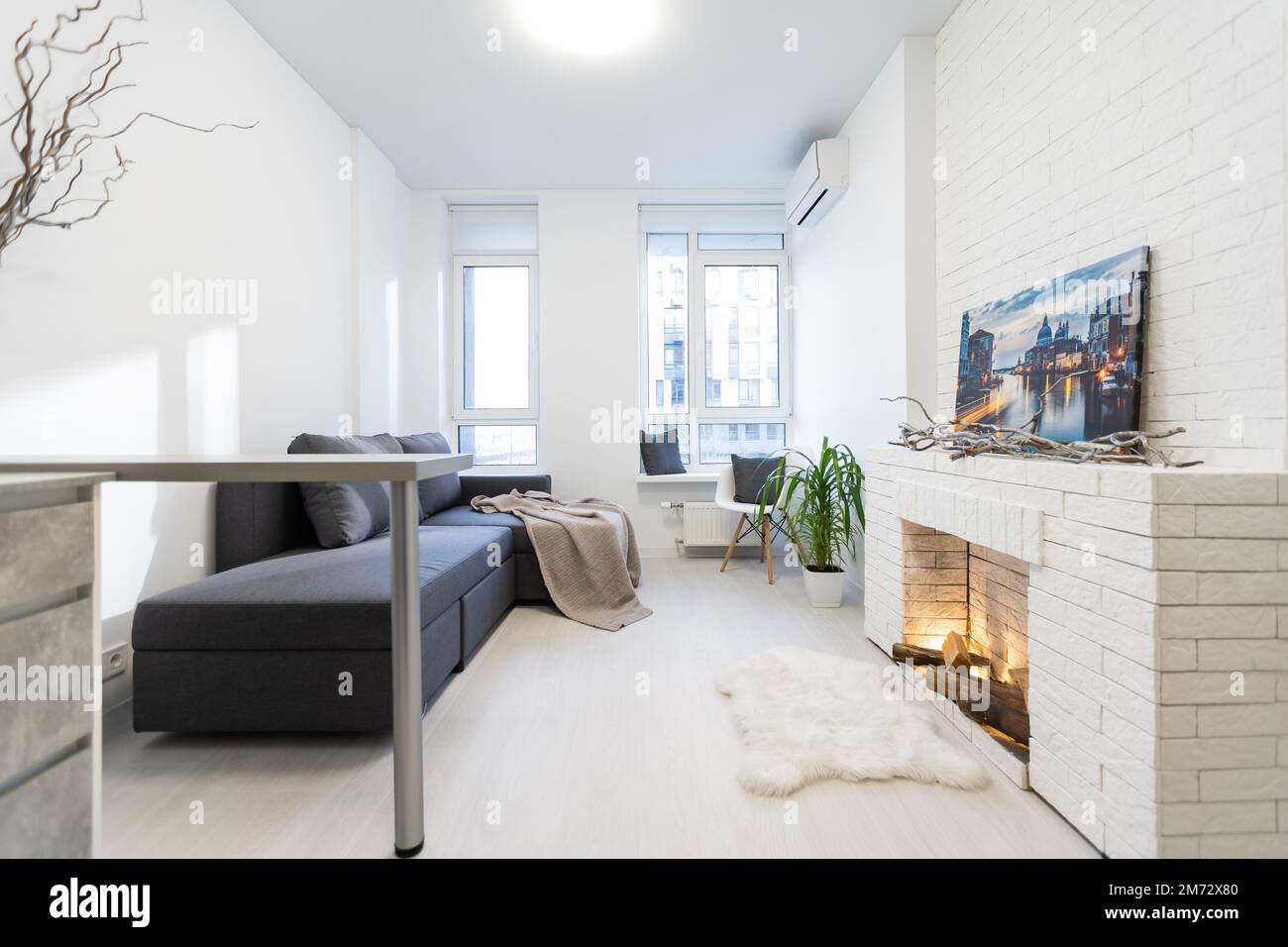Studio interior with fireplace. The interior of a small country house ...
