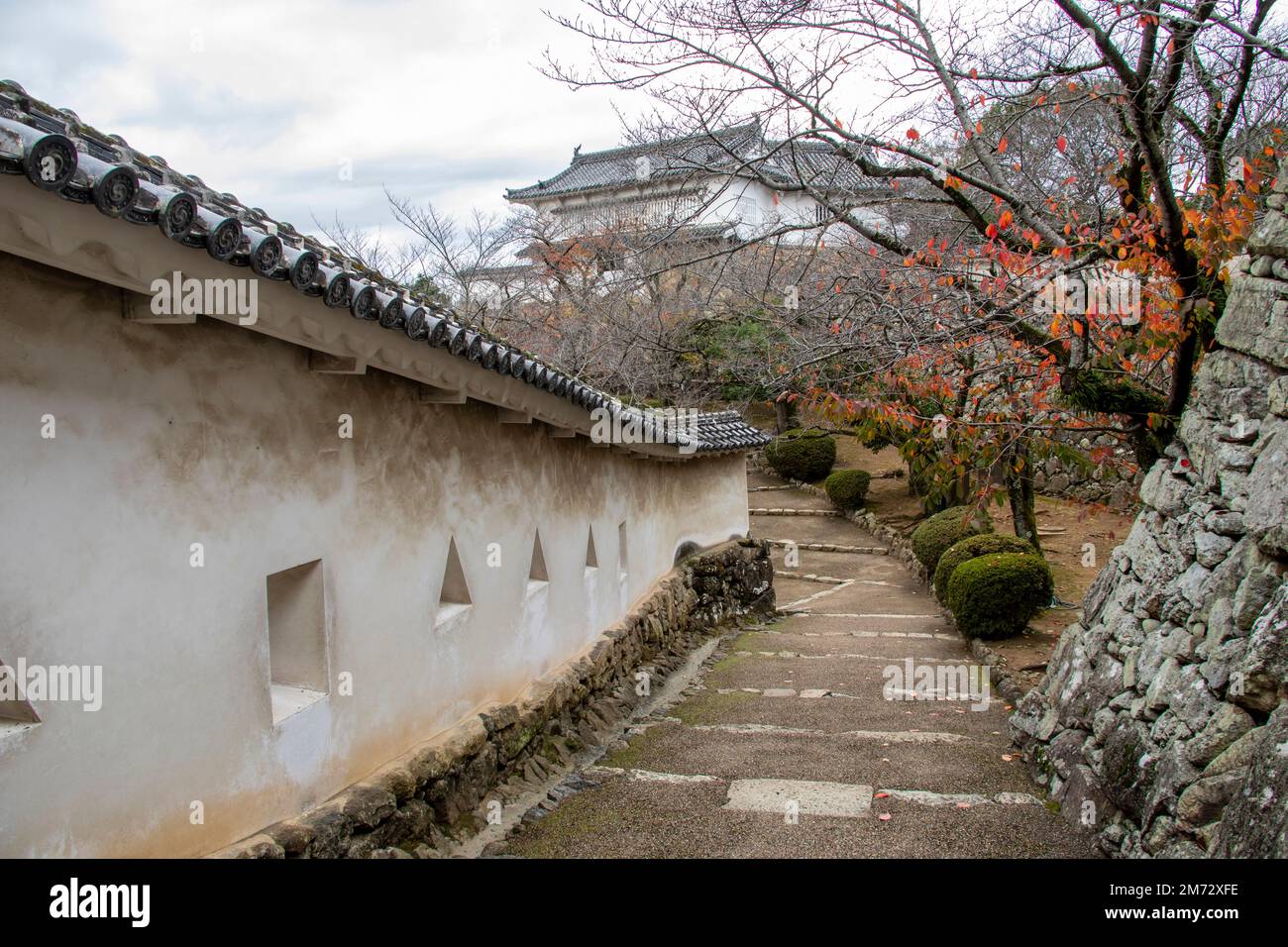 the wall in Himeji Castle, a hilltop Japanese castle complex. It is ...