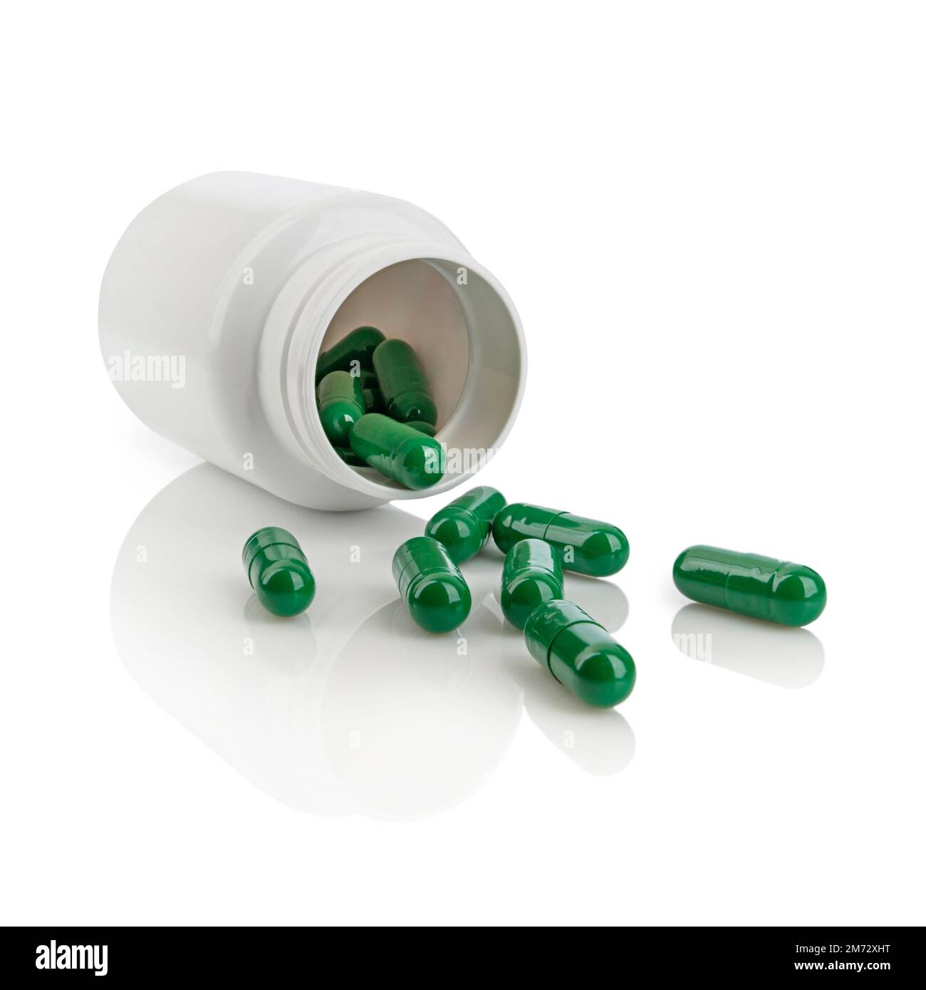Spilling vitamin capsules from pill hi-res stock photography and images ...