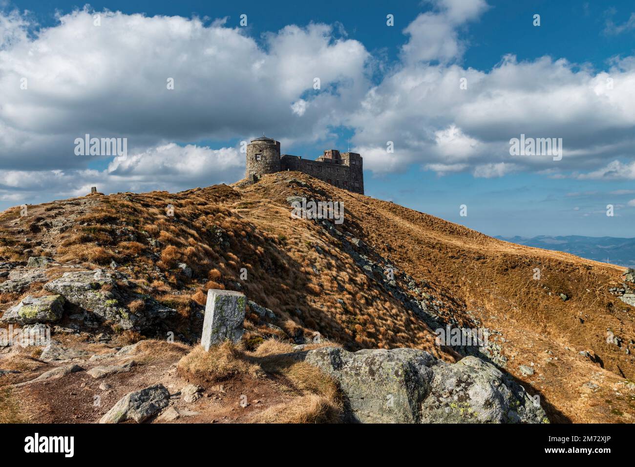 Winding road to old castle on the mountain top. Old polish observatory ...