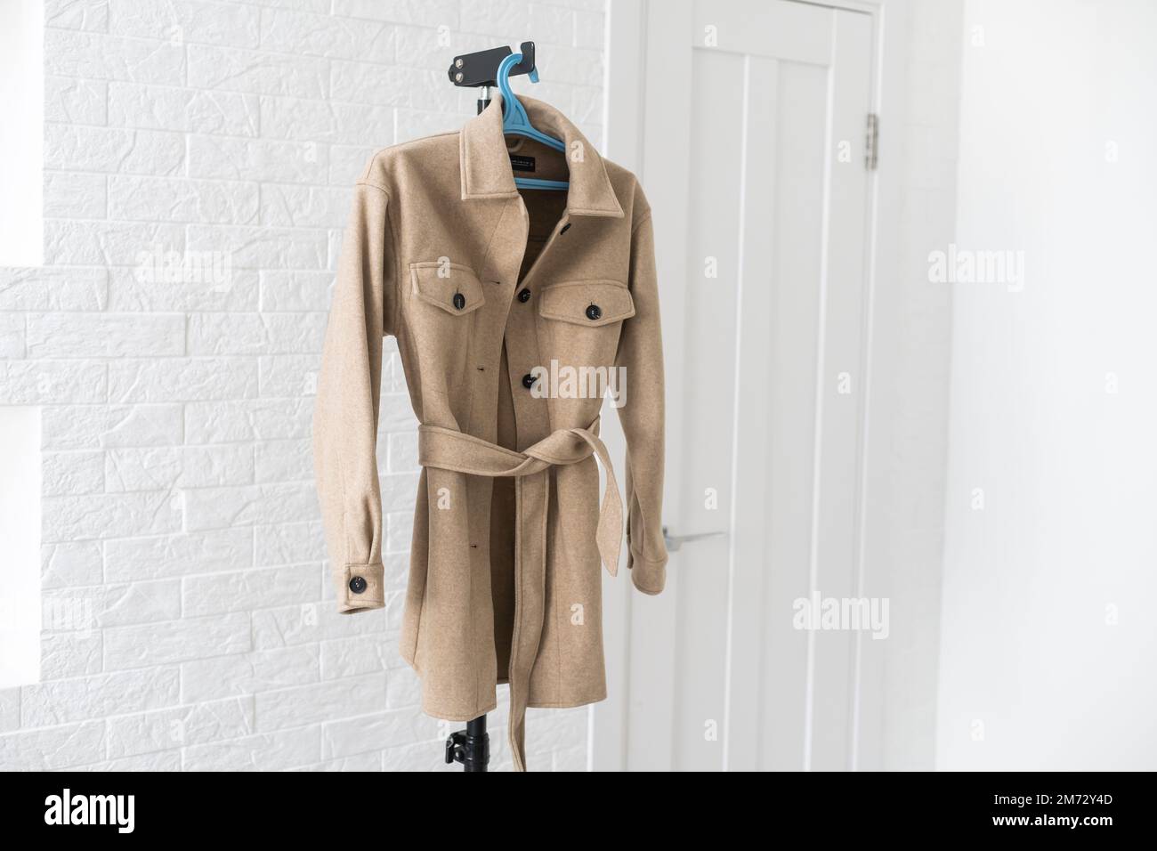 isolated women's long coat white background Stock Photo - Alamy