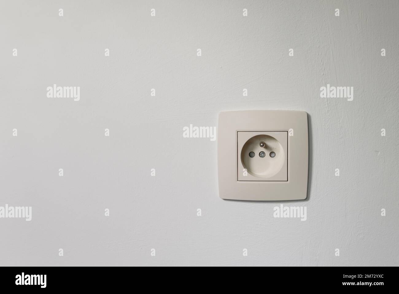 Standard socket in a house with a touch of dirt after long use Stock ...