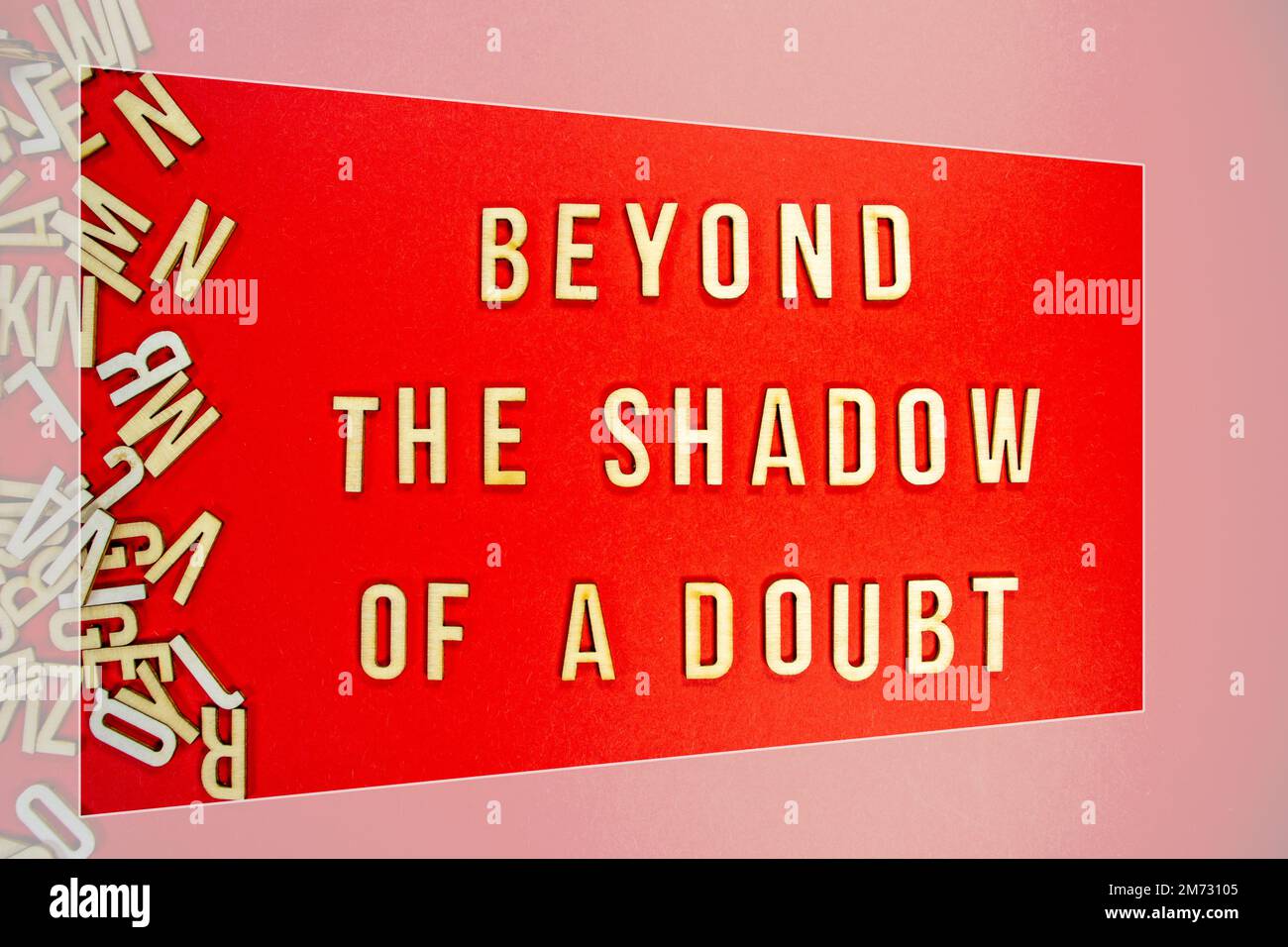 BEYOND THE SHADOW OF A DOUBT in wooden English language capital letters ...