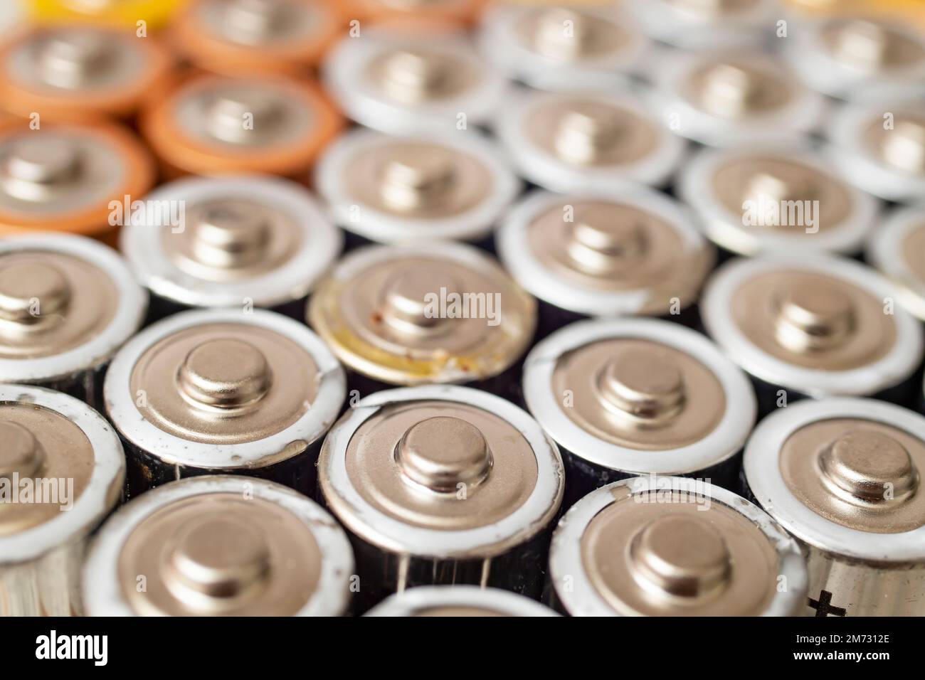 many batteries stacked, soft focus macro Stock Photo - Alamy