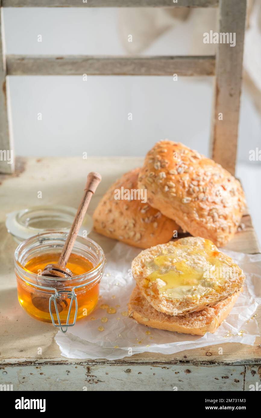 Fresh and tasty wholemeal buns for breakfast. Breakfast with milk and ...