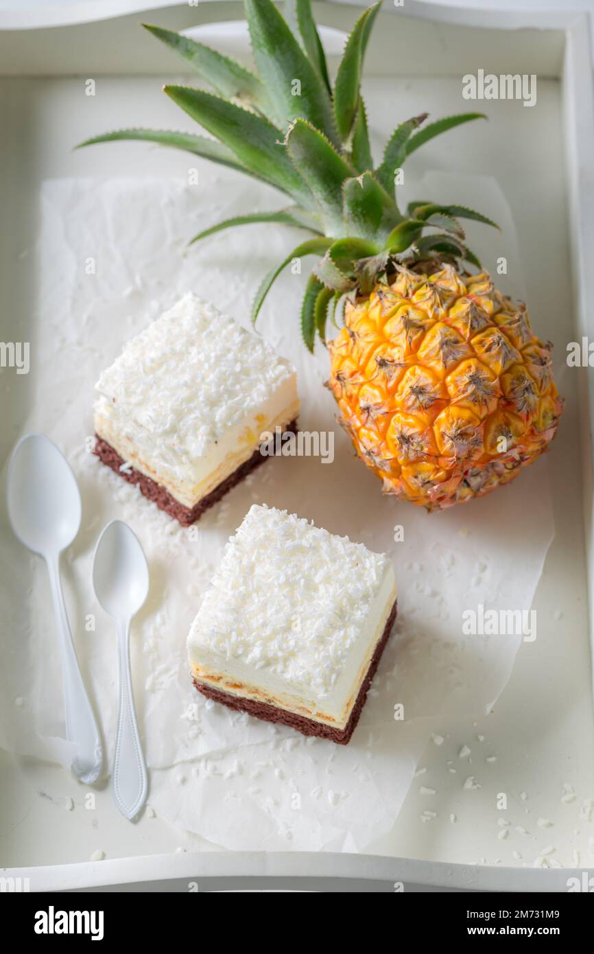 Tasty white cake made of coconut and pineapple. Sponge cake with ...