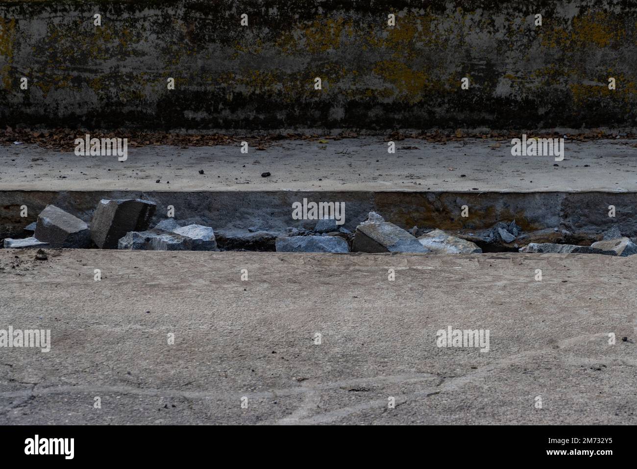 Concrete rubble in a ditch on a construction site Stock Photo - Alamy