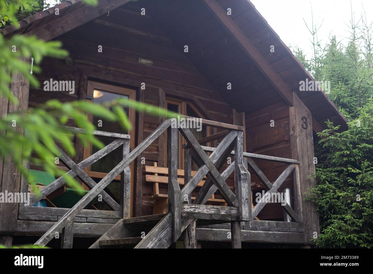 Wooden terrace of wooden house. wooden planking. windows. Outside ...