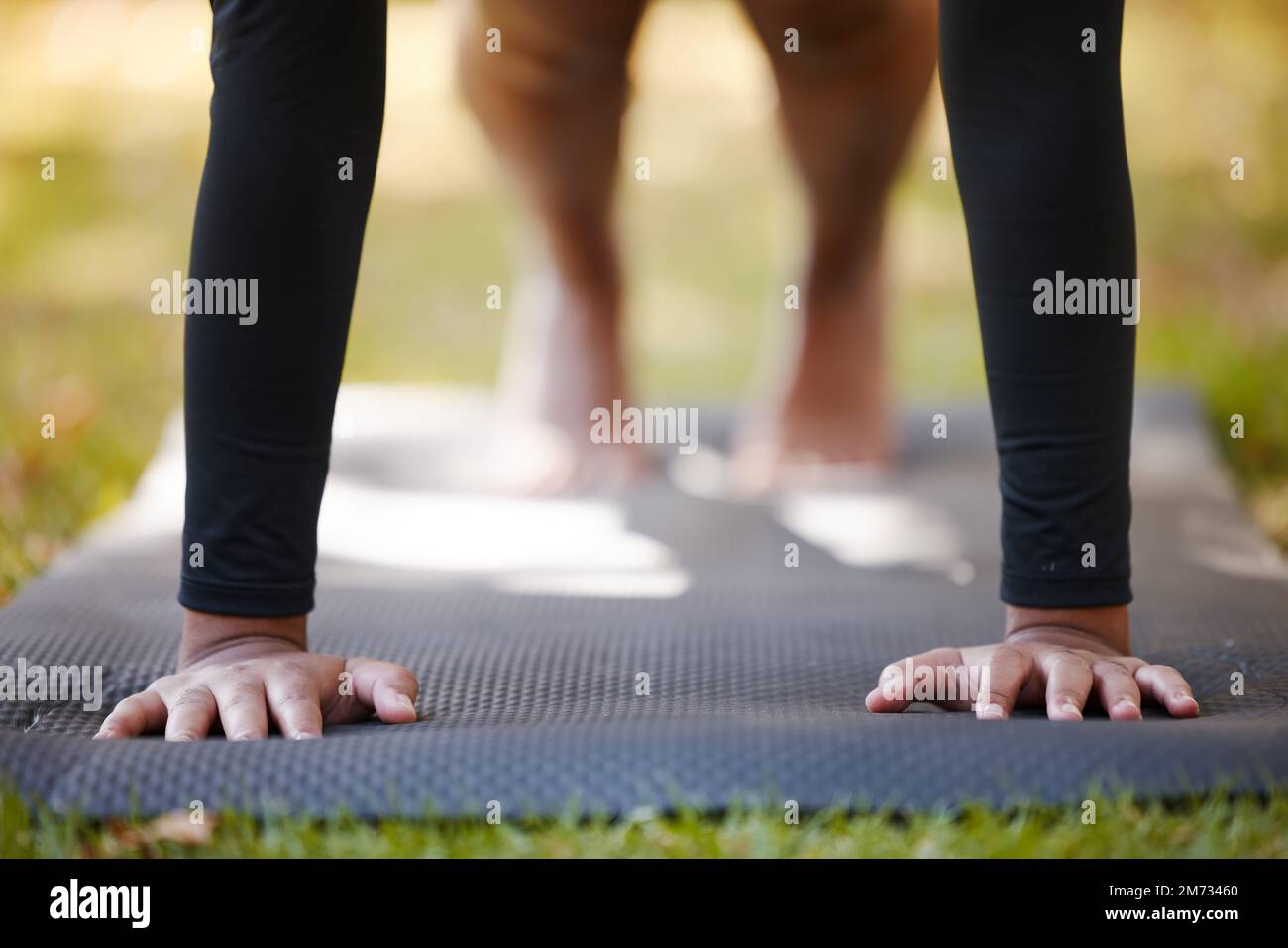 Hands, fitness push up and woman at park alone for health, wellness and ...