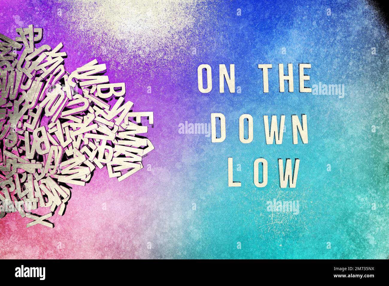 ON THE DOWN LOW in wooden English words language capital letters ...