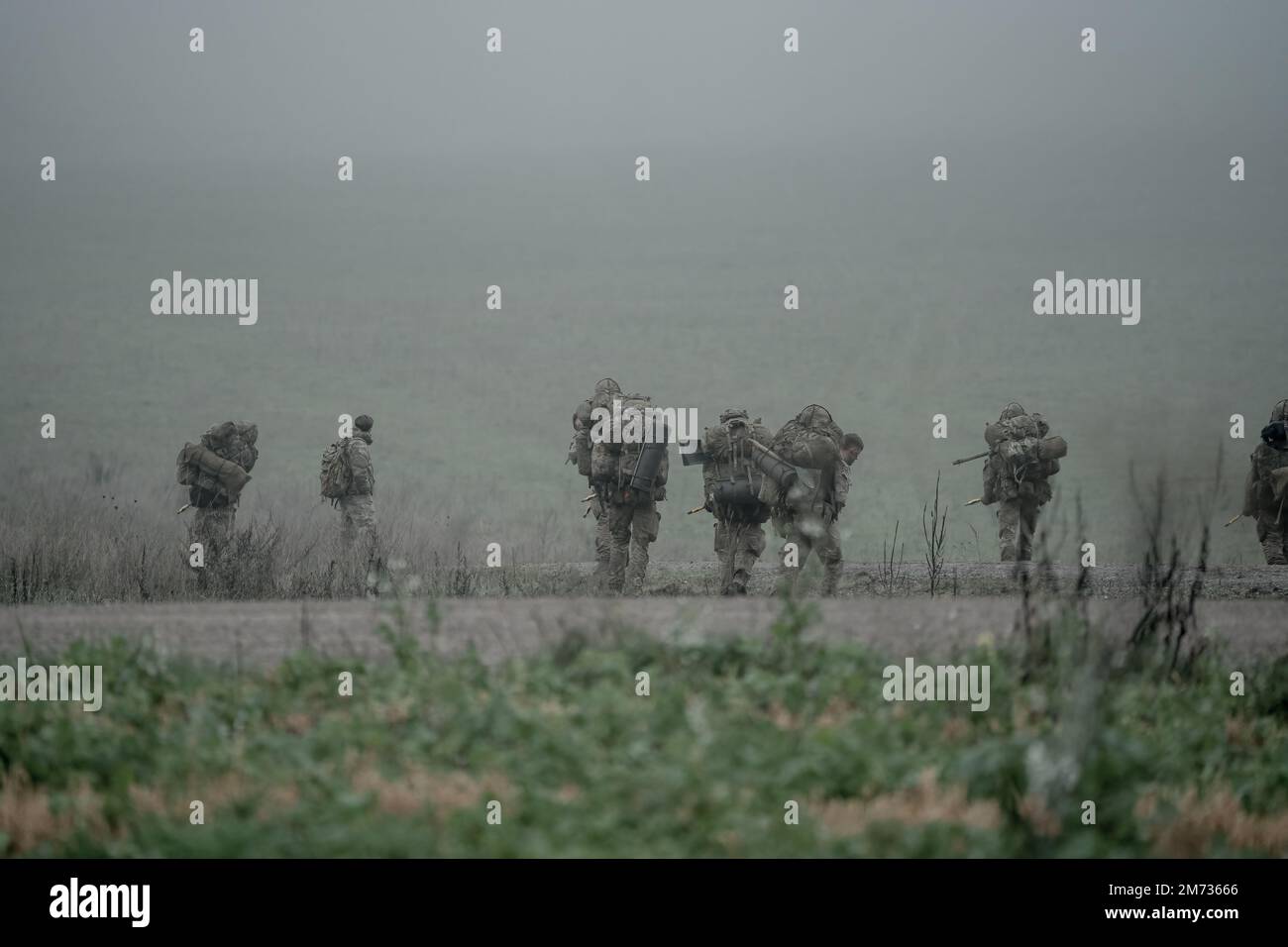 a unit of British army soldiers on a 40kg loaded march tab military ...