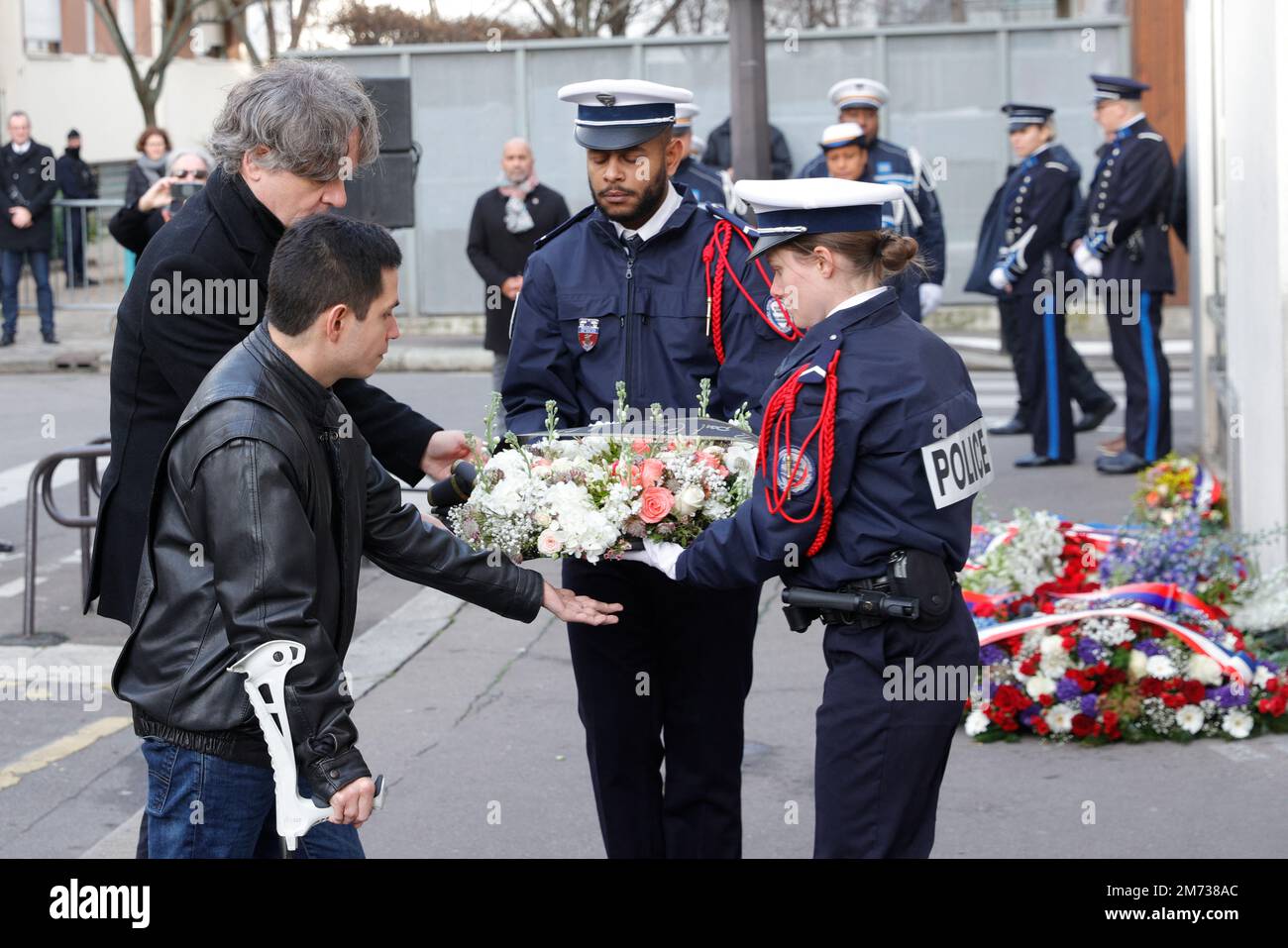 Charlie Hebdo webmaster Simon Fieschi (2ndL) and cartoonist Laurent ...