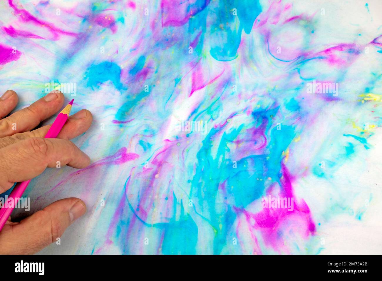 Primary colors watercolor abstract textured background with a hand ...