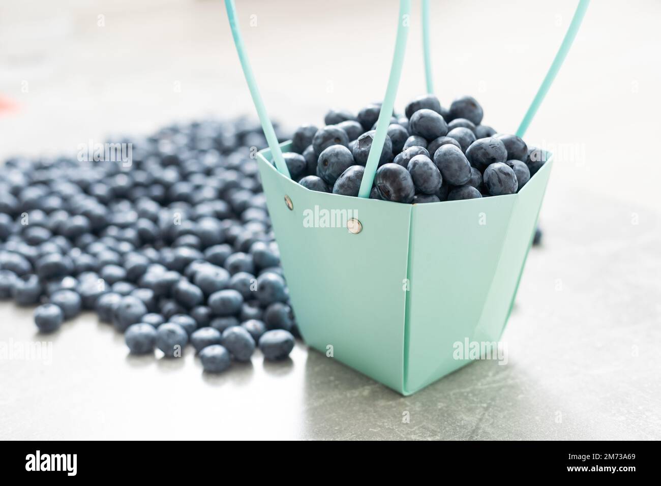 large blueberry with paper basket Stock Photo - Alamy