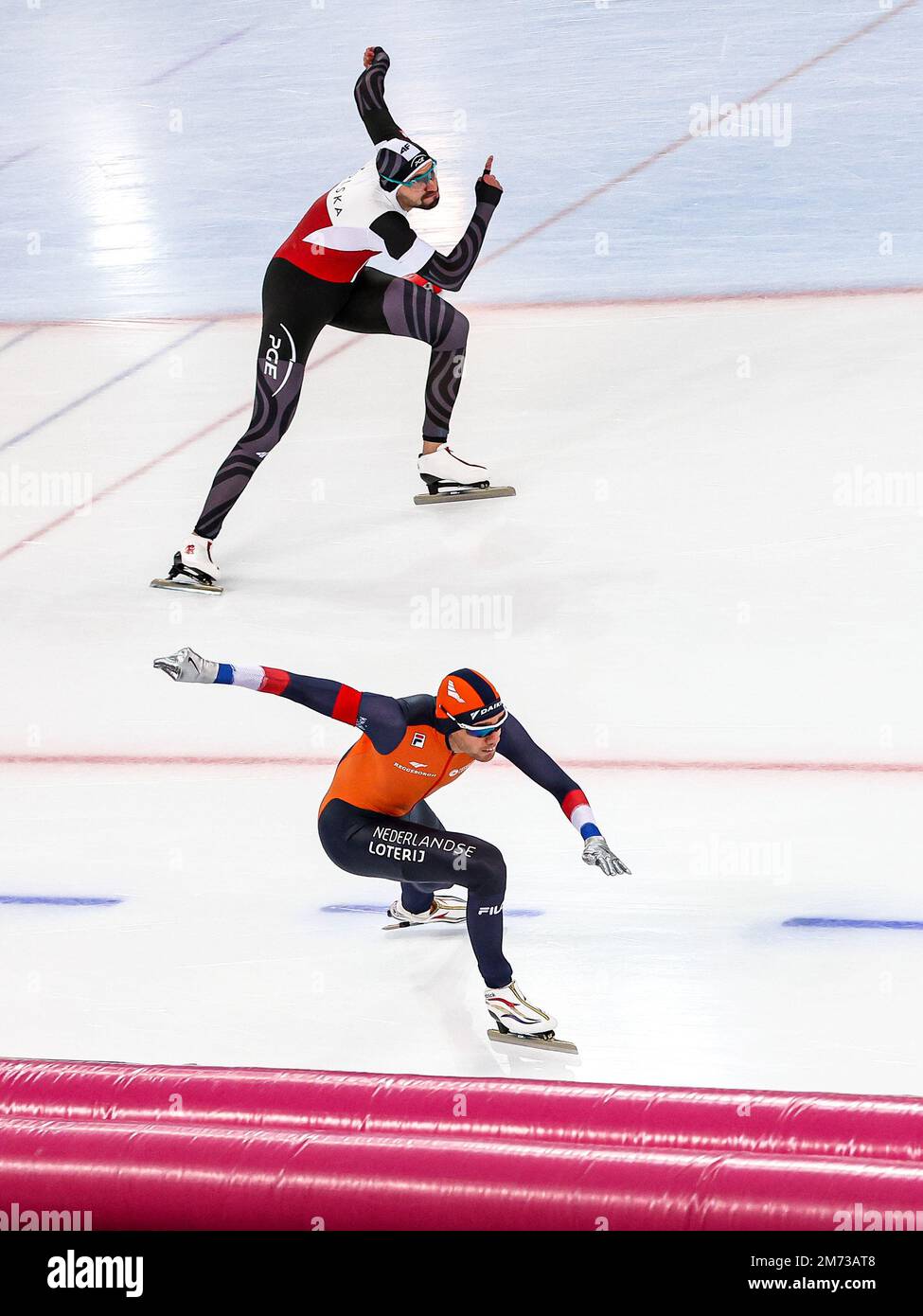 HAMAR - Szymon Palka (POL) and Patrick Roest (NED) in the men's 500m ...
