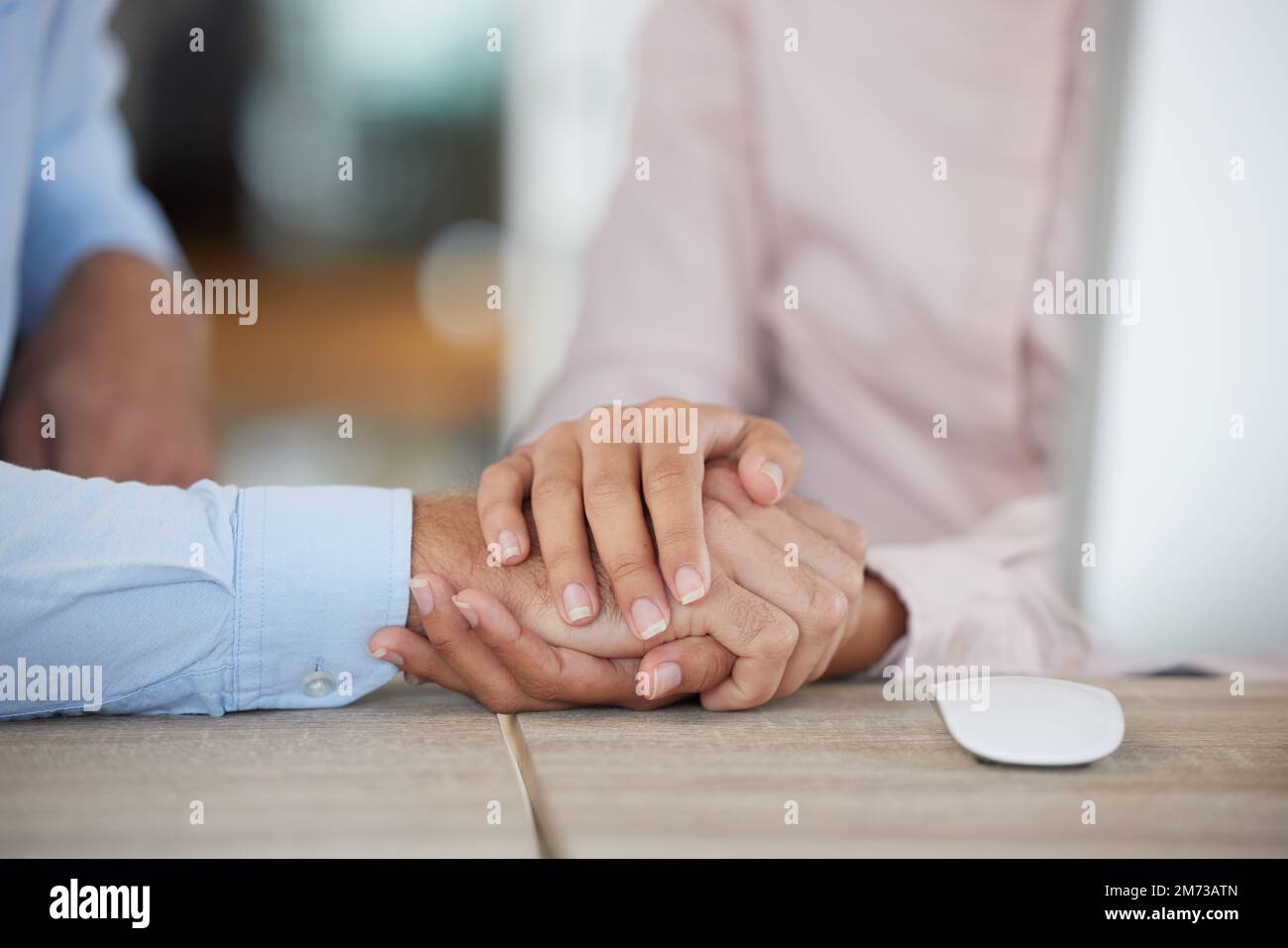 Support, trust and couple holding hands in office for unity, union or ...
