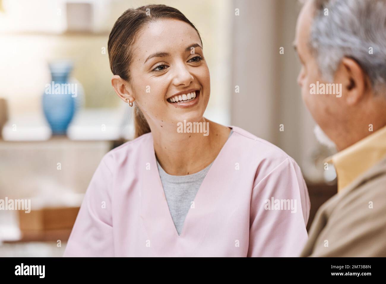 Healthcare nurse, senior man and retirement consultation in nursing home for medical wellness ...