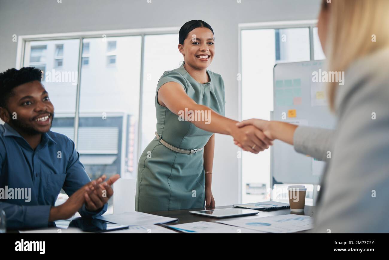 Business people, woman and handshake at meeting, planning and chart on board for target, success ...