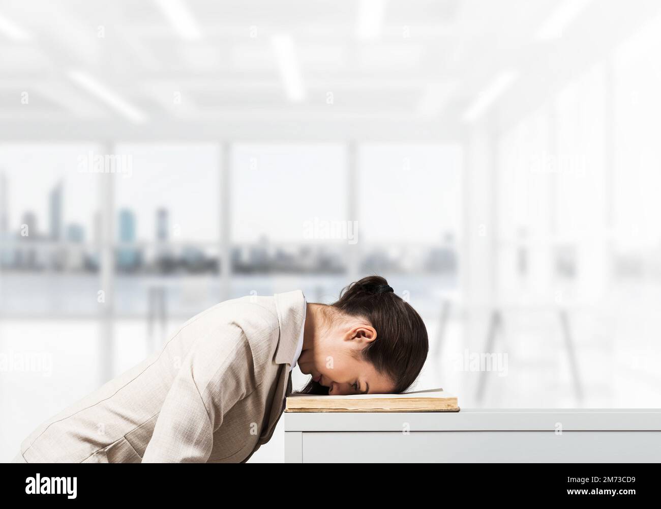 Exhausted business woman face down sleeping Stock Photo - Alamy