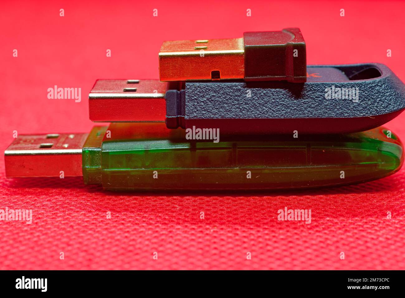 Close-up, cropped, Copyspace: side view of three USB sticks stacked on ...