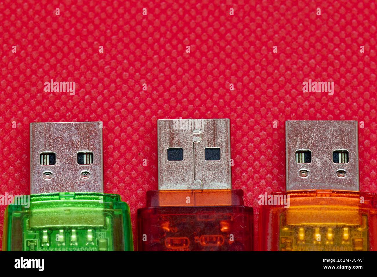 Close-up, cropped, Copyspace: Top view of three USB sticks side by side ...