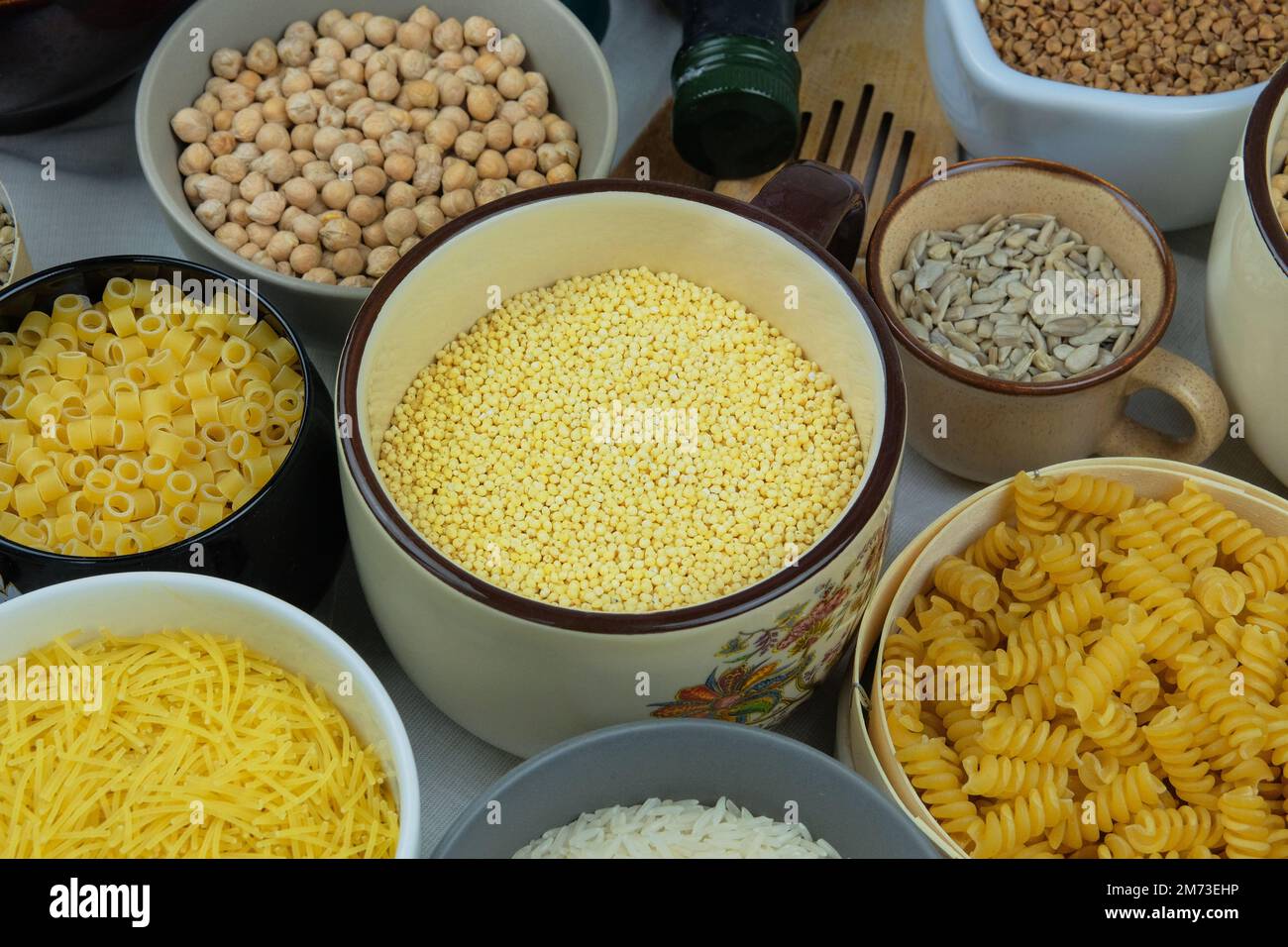 Yellow millet in bowl. Shopping and storage products. Vegetarian ...