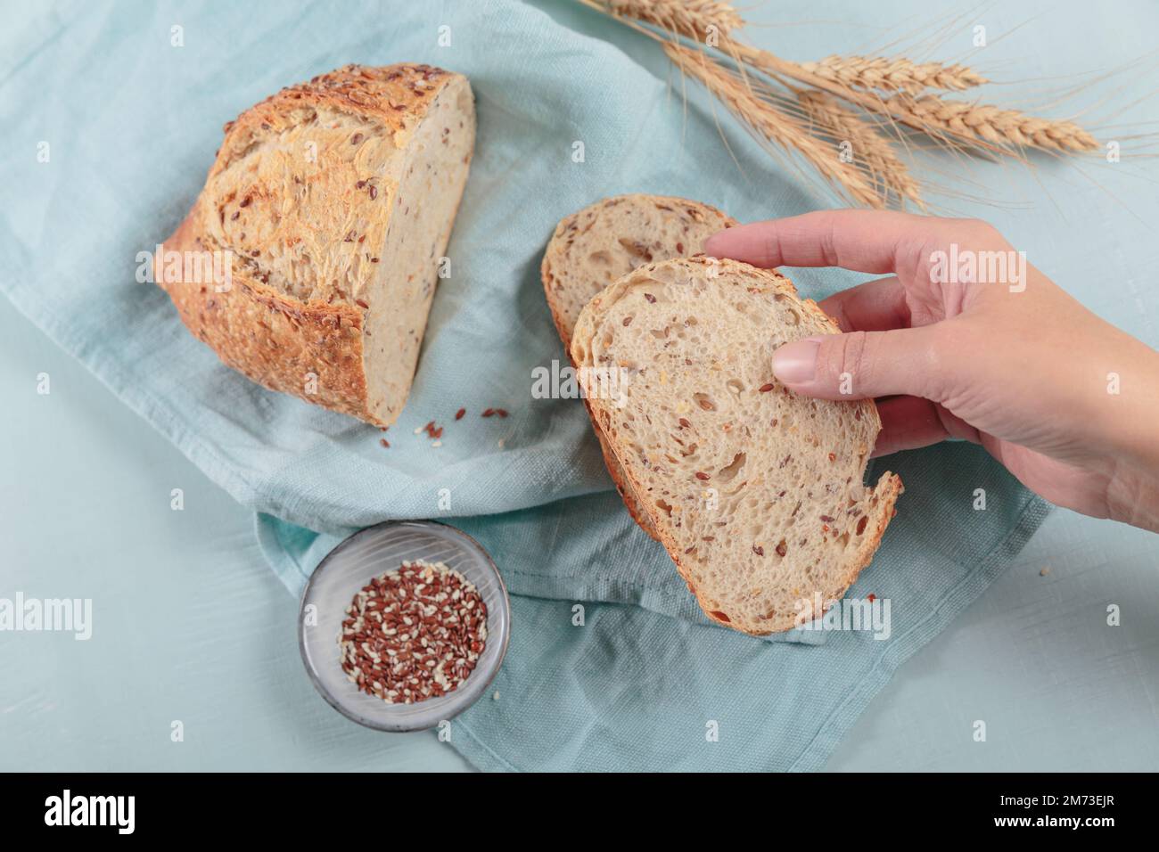 Sliced fresh baked whole grain bread with flax seeds Stock Photo - Alamy