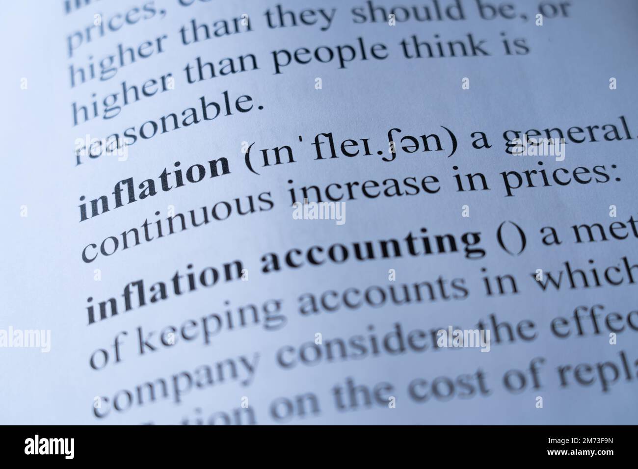 A mock up of a dictionary page with the word inflation with selective ...