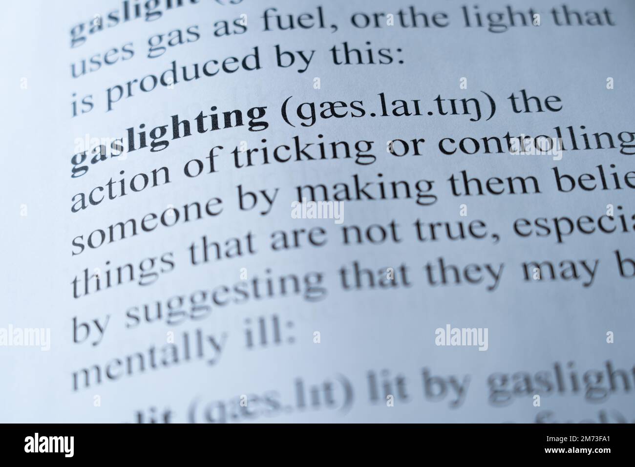 A mock up of a dictionary page with the word gaslighting with selective ...