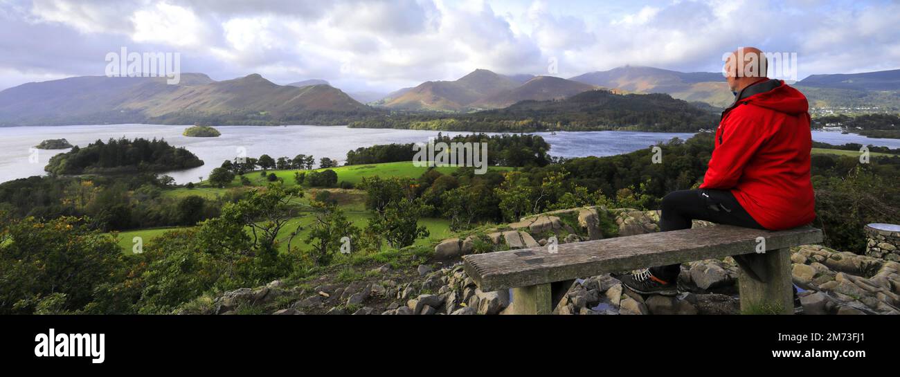 Walker on Castlehead fell above Derwentwater, Keswick town, Cumbria ...