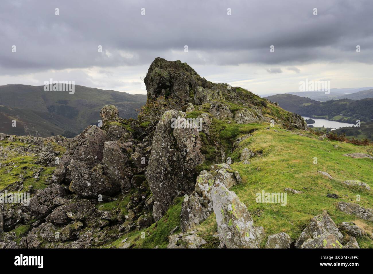 The Howitzer rock, the true summit of Helm Crag fell, above Grasmere in ...