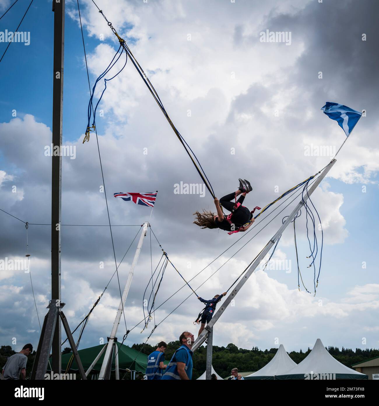 Bungee bouncing for kids at Border Union Show, Kelso, Scotland Stock ...