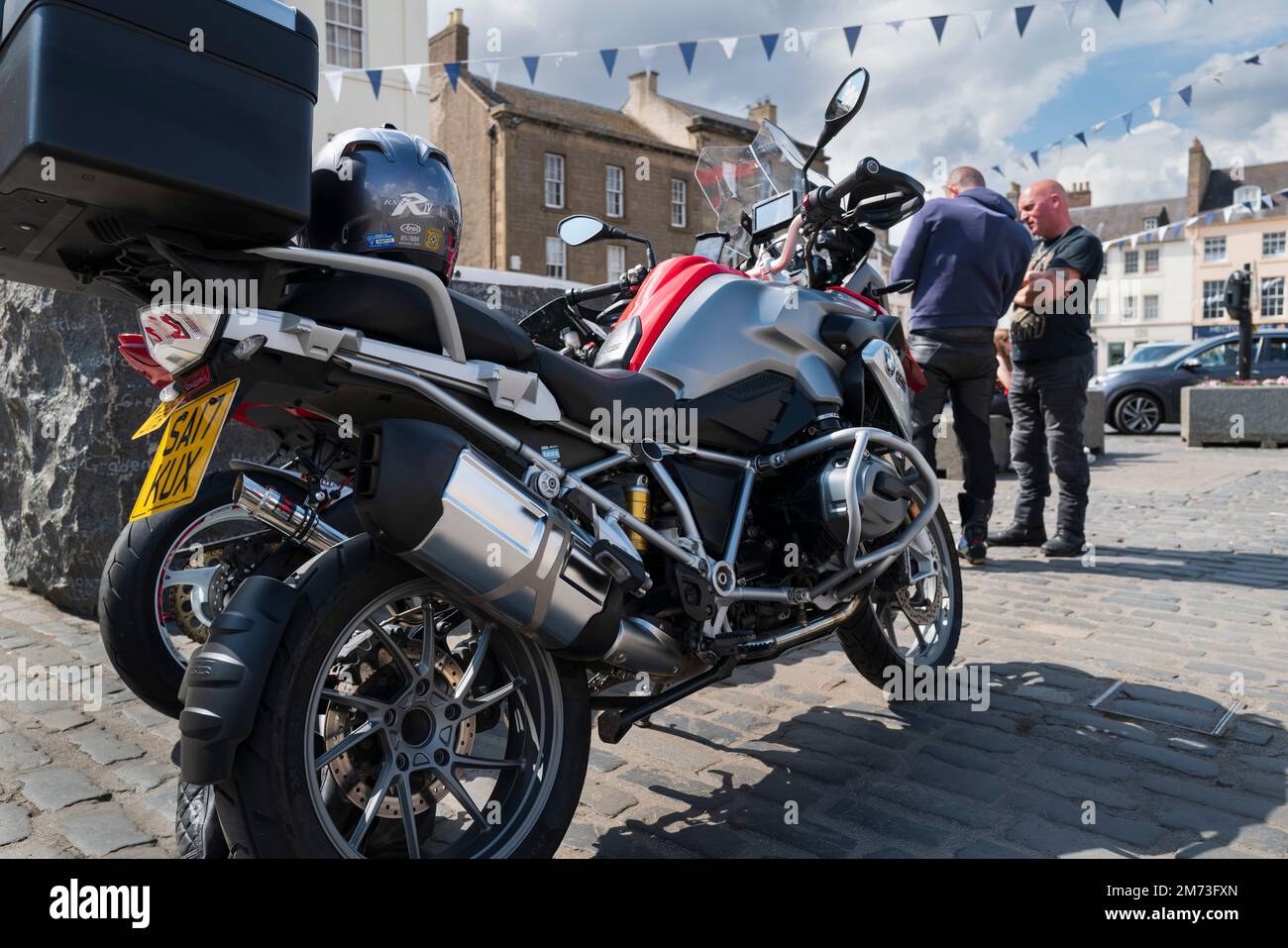 Motorcycle touring riders stop for a break on a summer day in Kelso ...