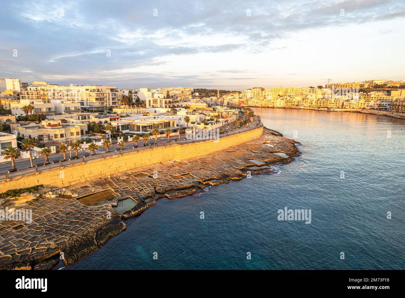 Marsaskala waterfront at sunrise, Malta. Aerial Drone View Stock Photo ...