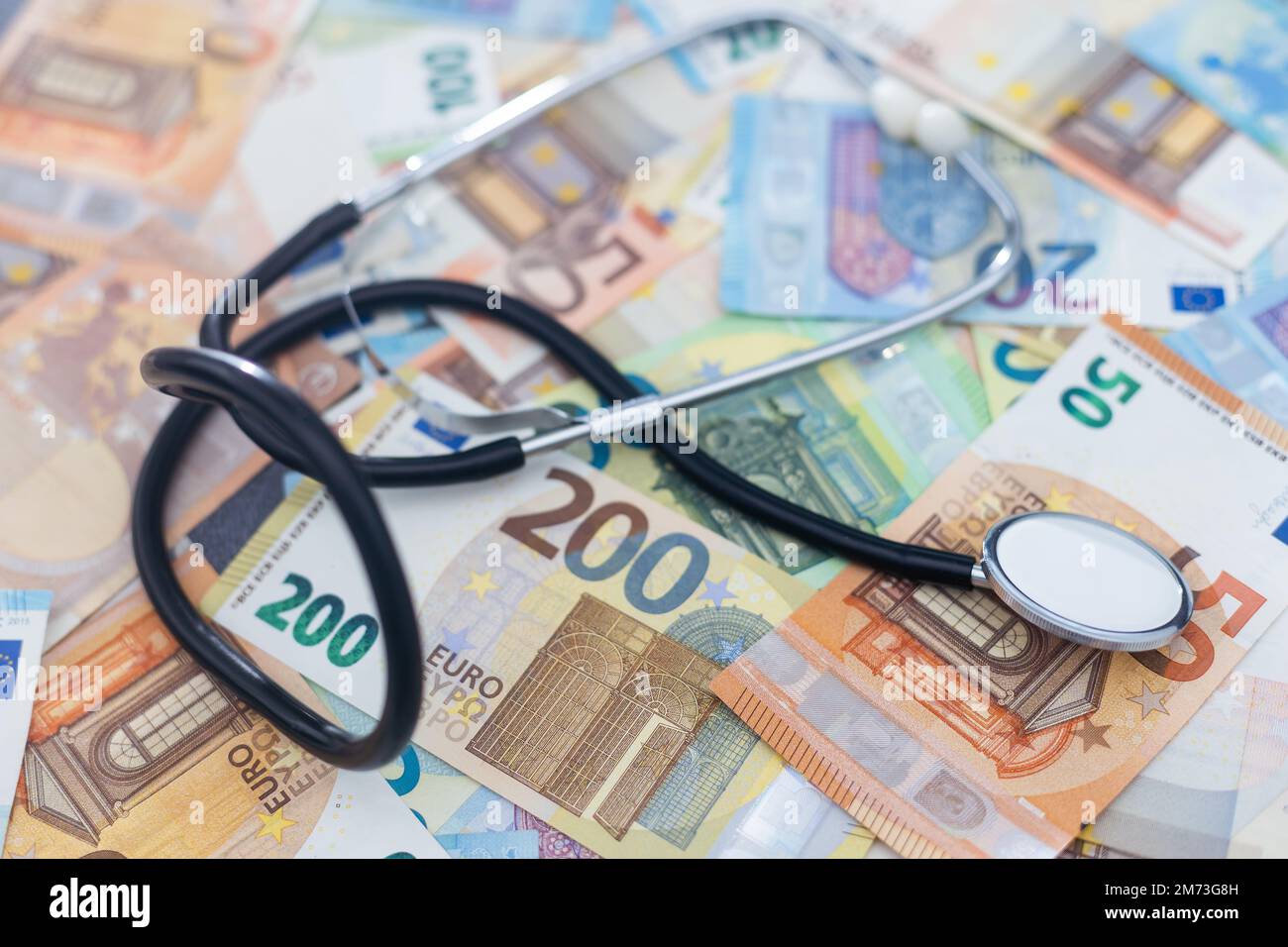 European currency sick concept: stethoscope on euro banknotes Stock ...