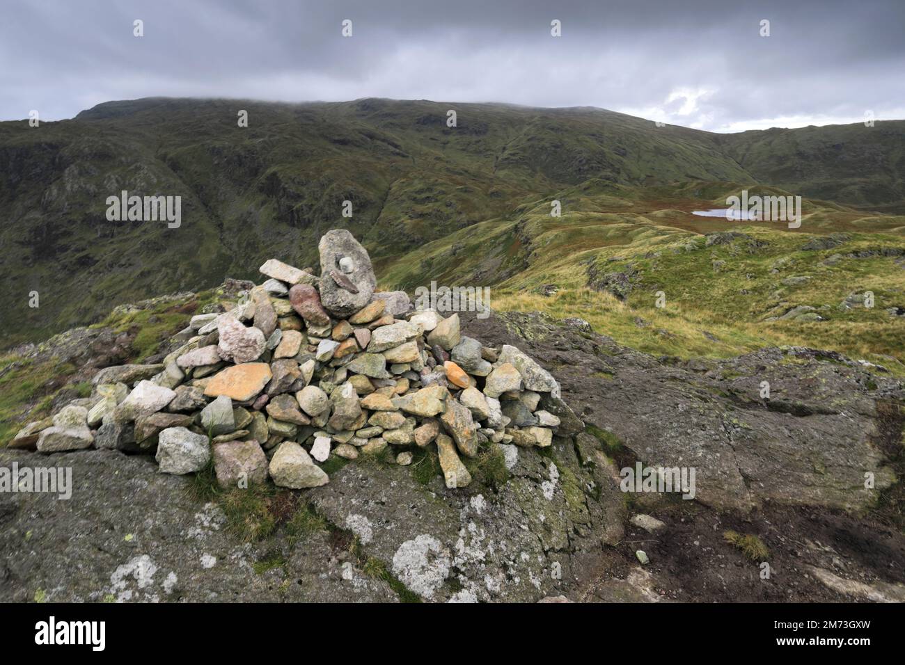 The summit cairn on Calf Crag fell, above Thirlmere in the Central ...