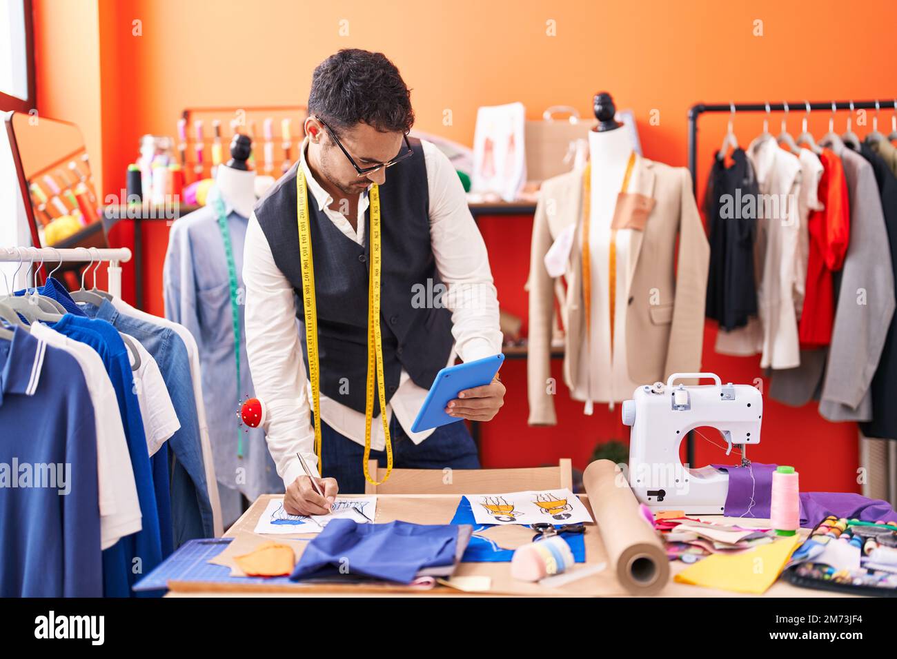 Male Fashion Designer At Work