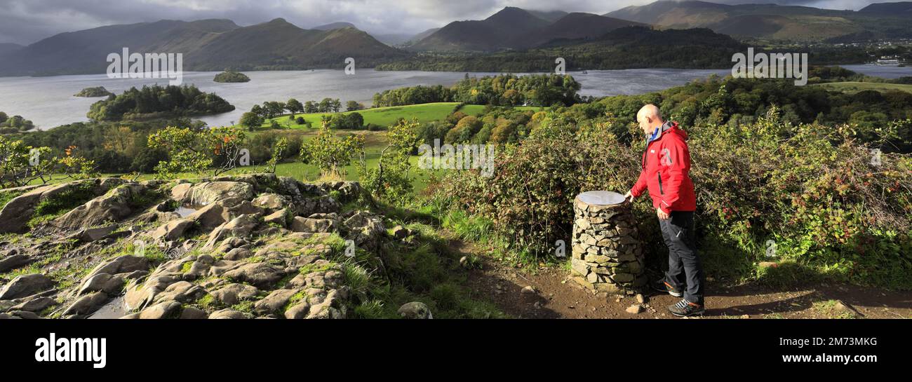Walker on Castlehead fell above Derwentwater, Keswick town, Cumbria ...