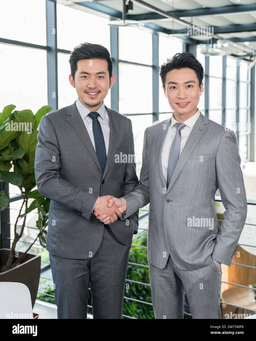 Business people shake hands Stock Photo - Alamy